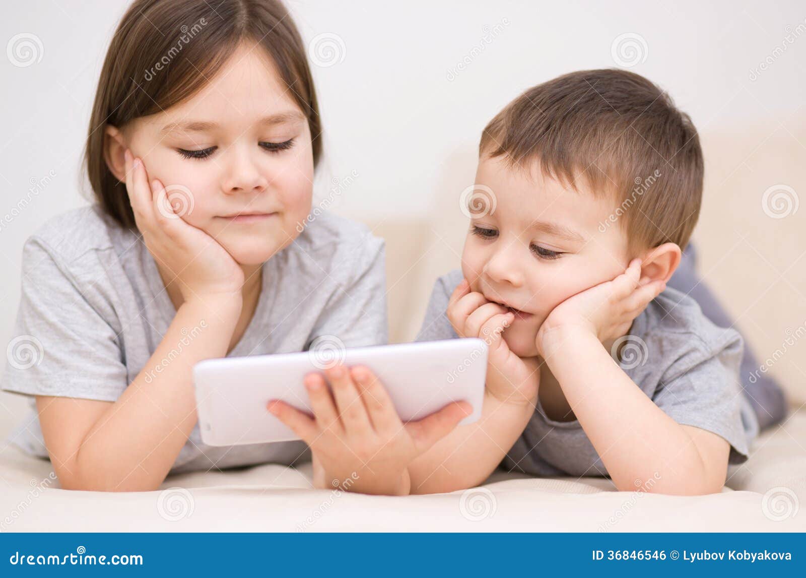 Children Using Tablet Computer Stock Photo - Image of brunette, girl ...