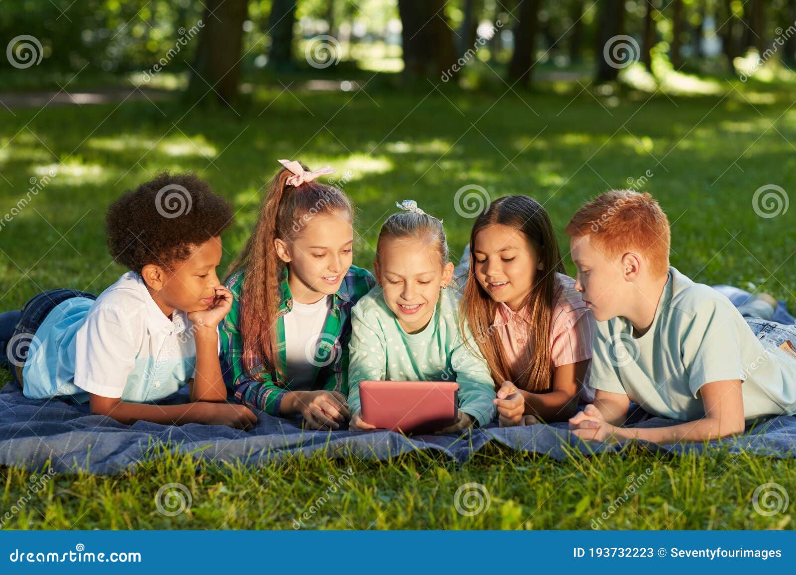 Children Using Tablet in Park Stock Image - Image of learning ...