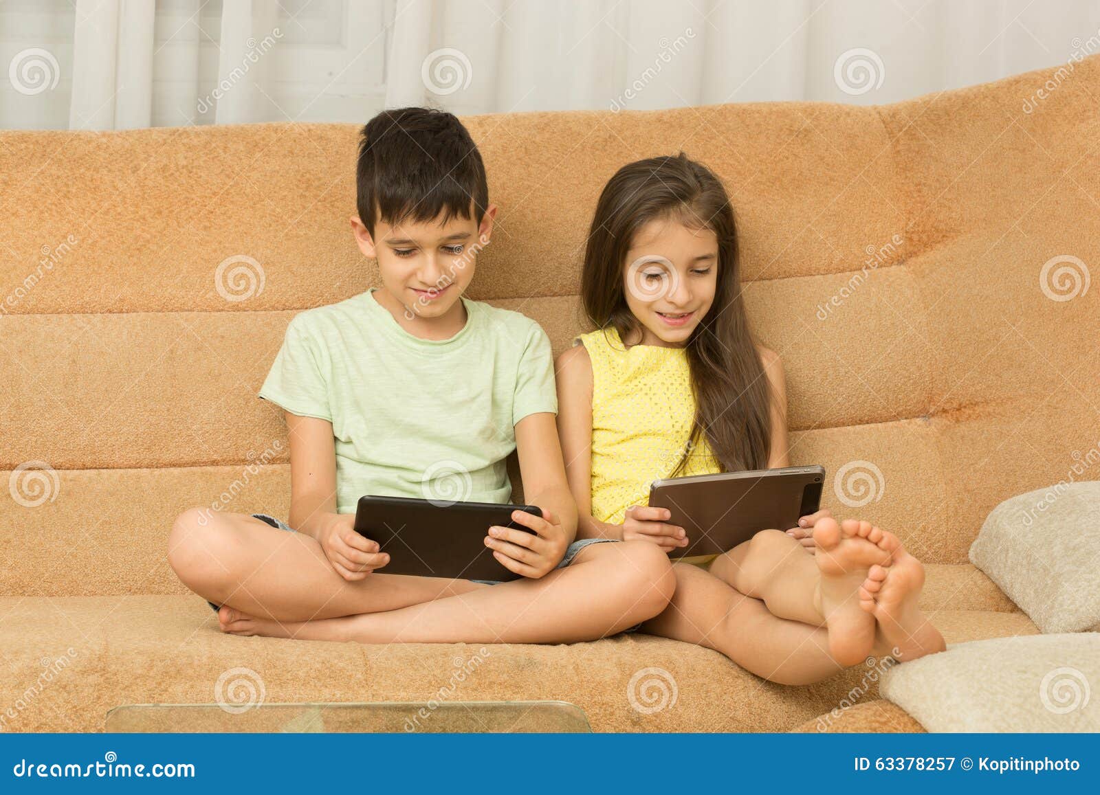 Children are Using Tablet while Sitting on the Stock Image - Image of ...