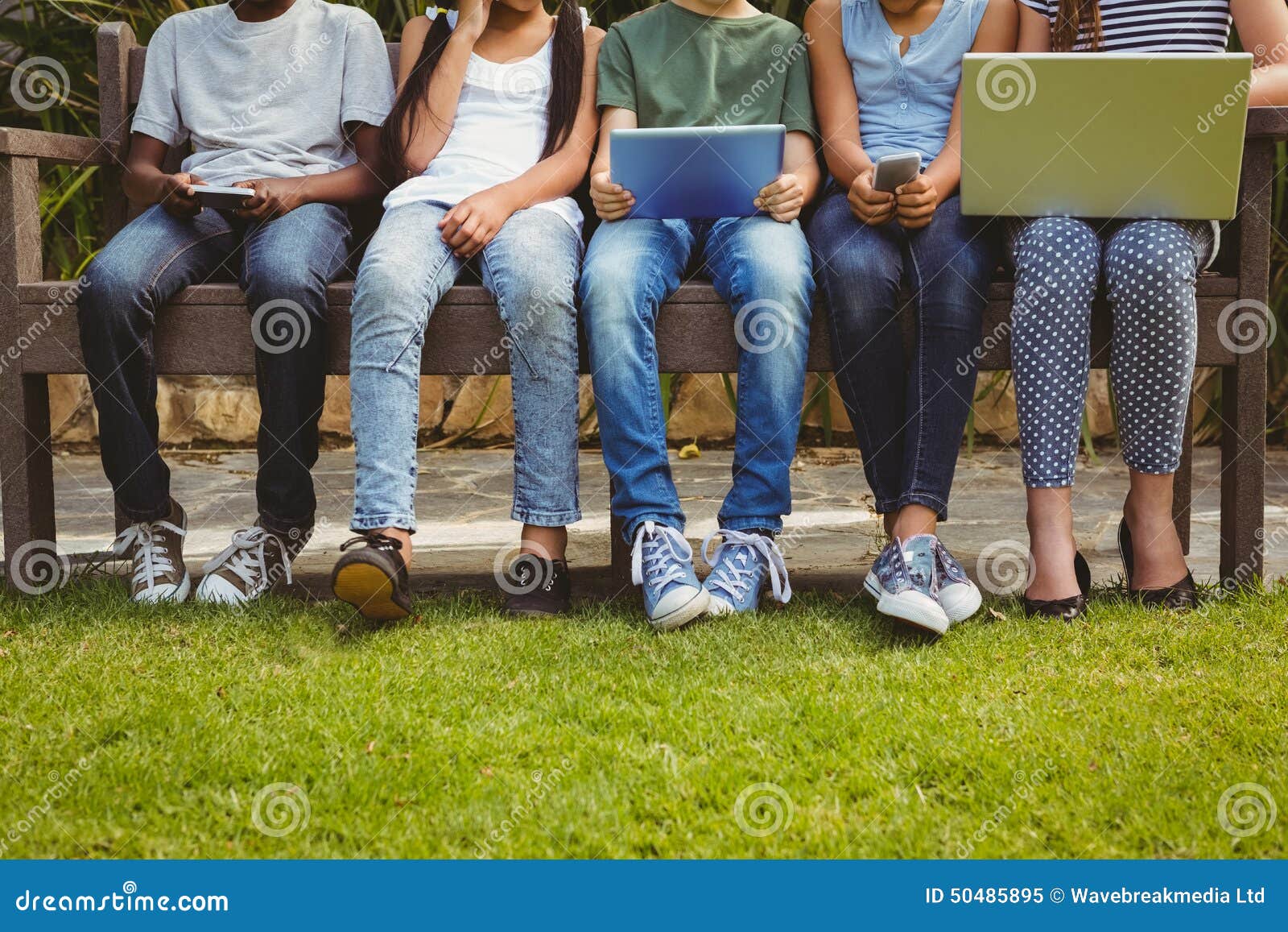 Children Using Technologies at Park Stock Image - Image of male ...