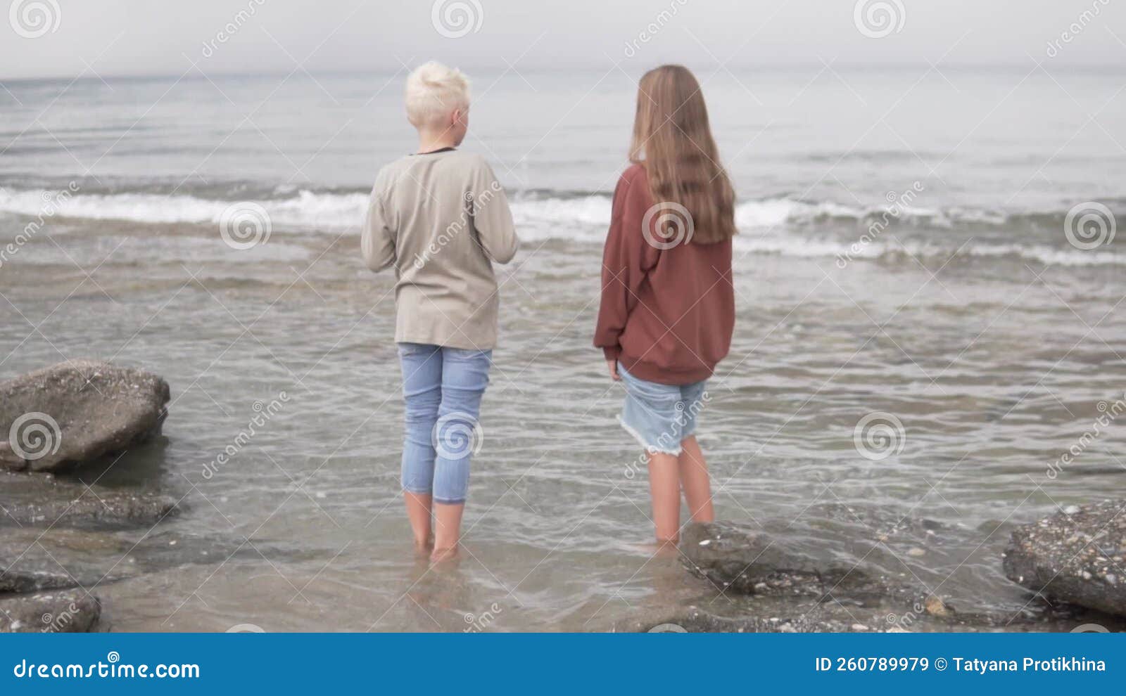 Children Walk on Beach Trough Water Stock Video - Video of coast ...