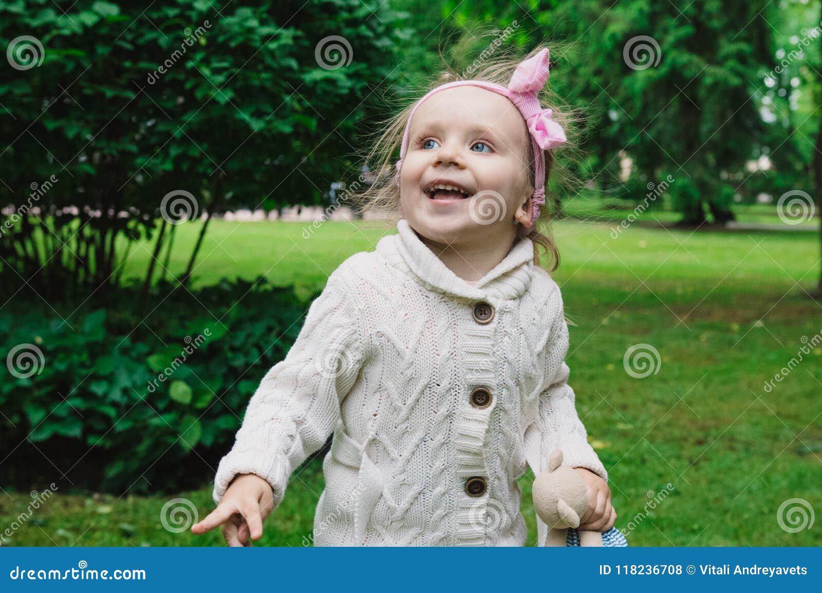 Children Walk in the Park on a Day Off. the Sun is Shining Stock Photo ...