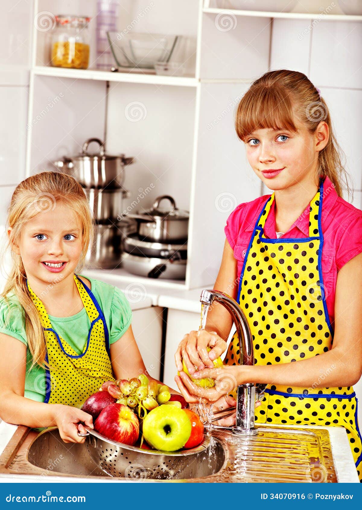 Children Washing Fruit at Kitchen. Stock Photo - Image of dishes ...