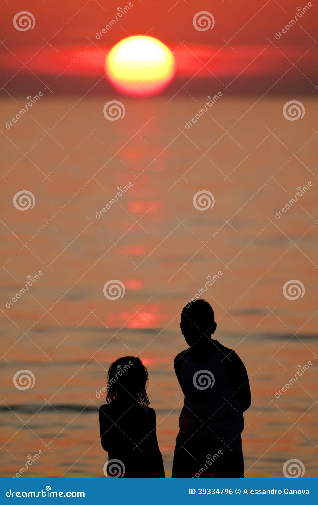 Children Watching the Sunset Stock Photo - Image of nature, skyline ...