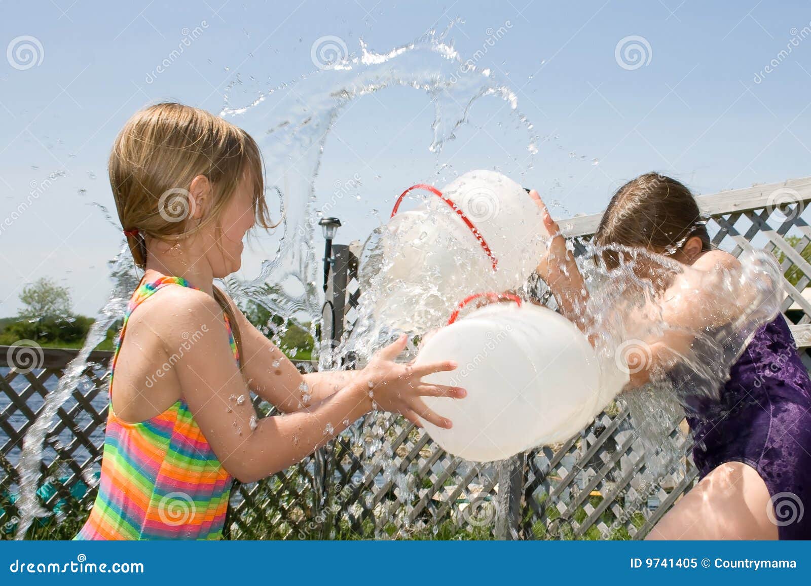 Children in water fight. stock image. Image of laughing - 9741405