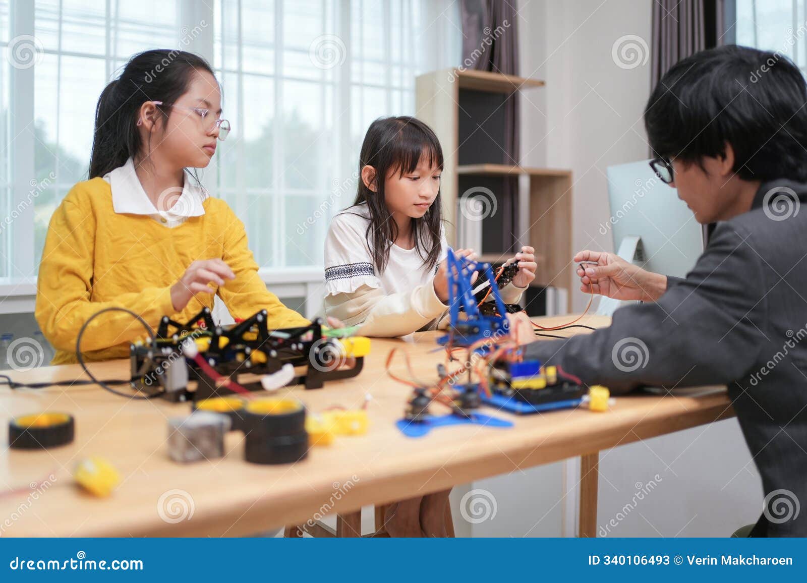 Children Working on Circuit Boards of Small Robot at Technology and ...
