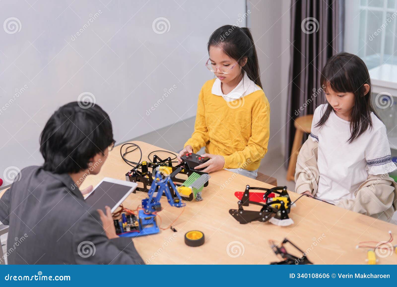 Children Working on Circuit Boards of Small Robot at Technology and ...