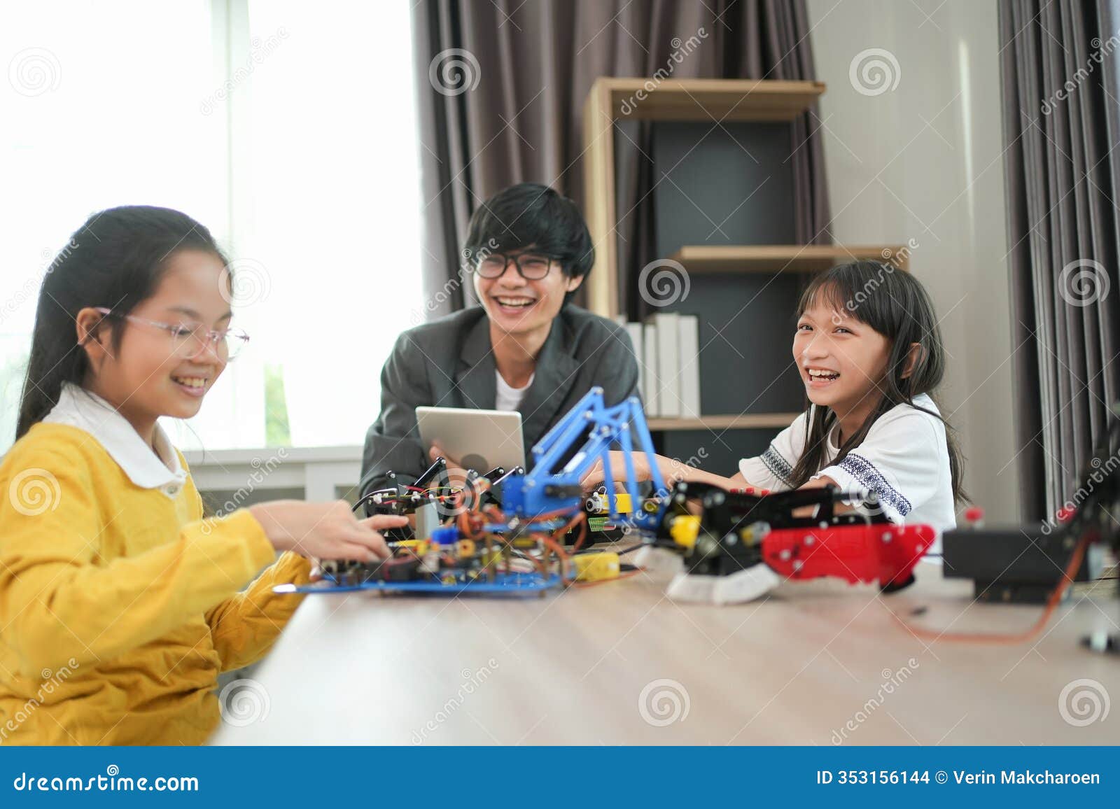 Children Working on Circuit Boards of Small Robot at Technology and ...