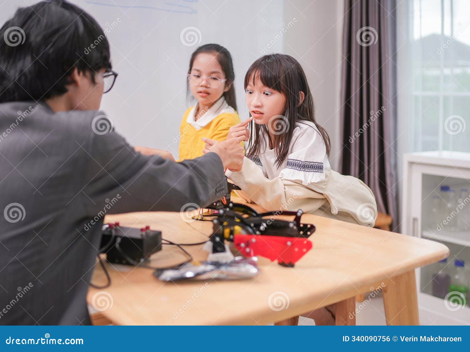 Children Working on Circuit Boards of Small Robot at Technology and ...