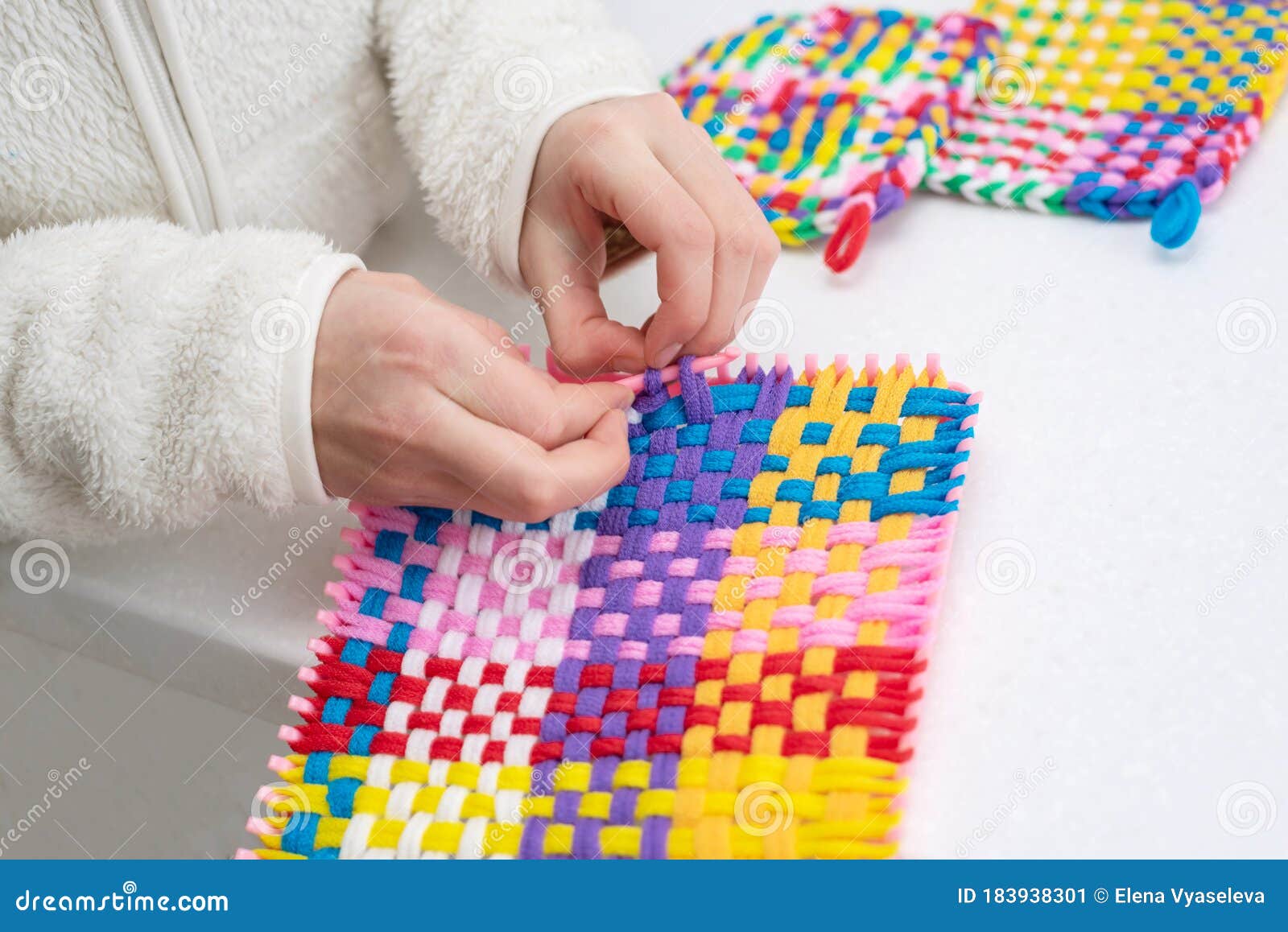 Childrens Creativity Weaving with Colored Threads Ropes Stock Image ...