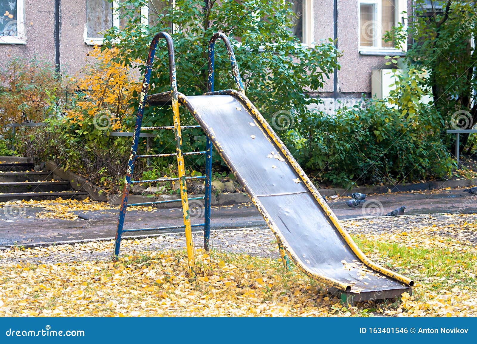 Childrens Metal Slide with Peeling Paint Stock Photo - Image of park ...
