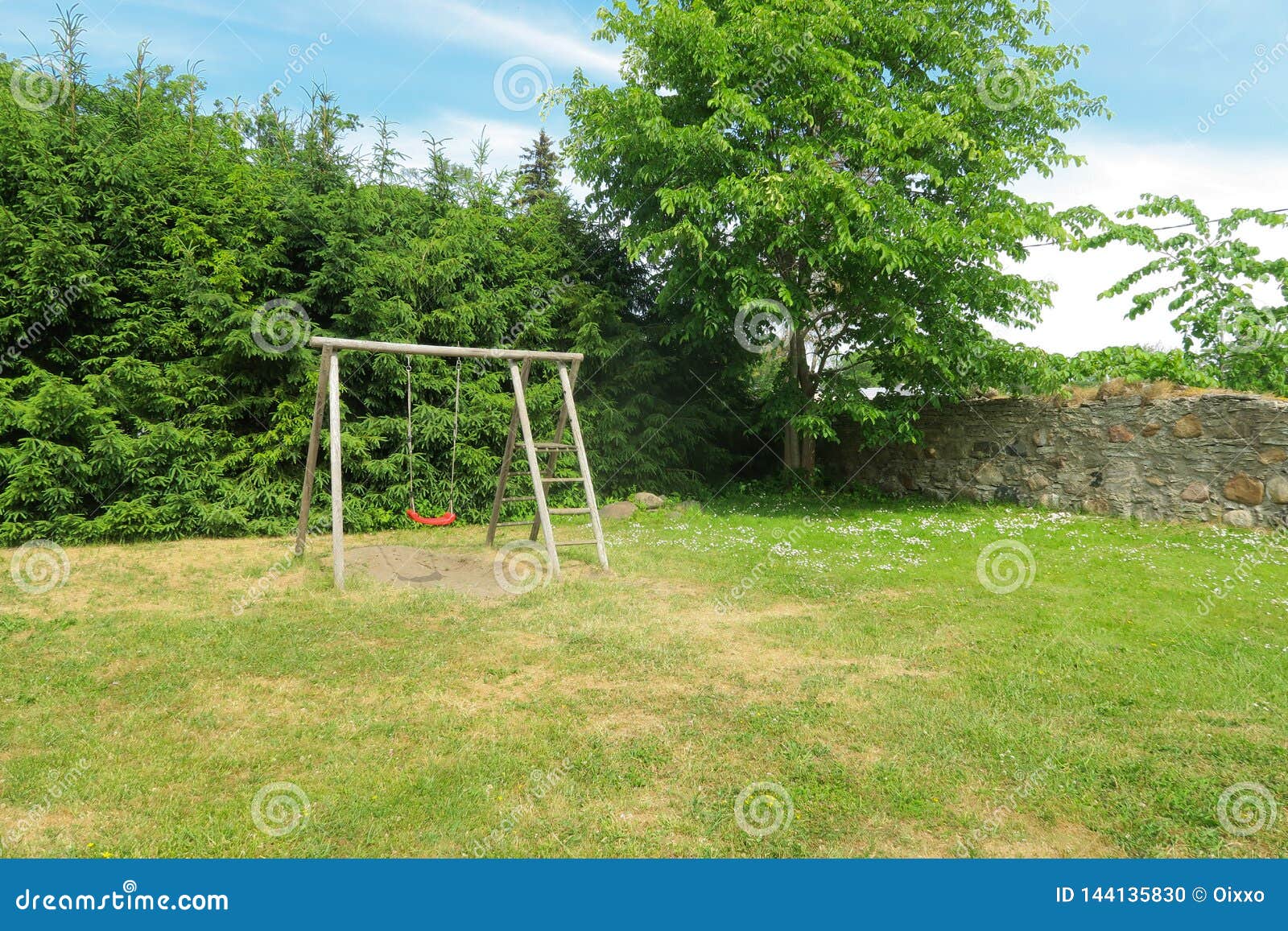 Childrens Swing Set in Green Park. Eco Backyard Stock Photo - Image of ...