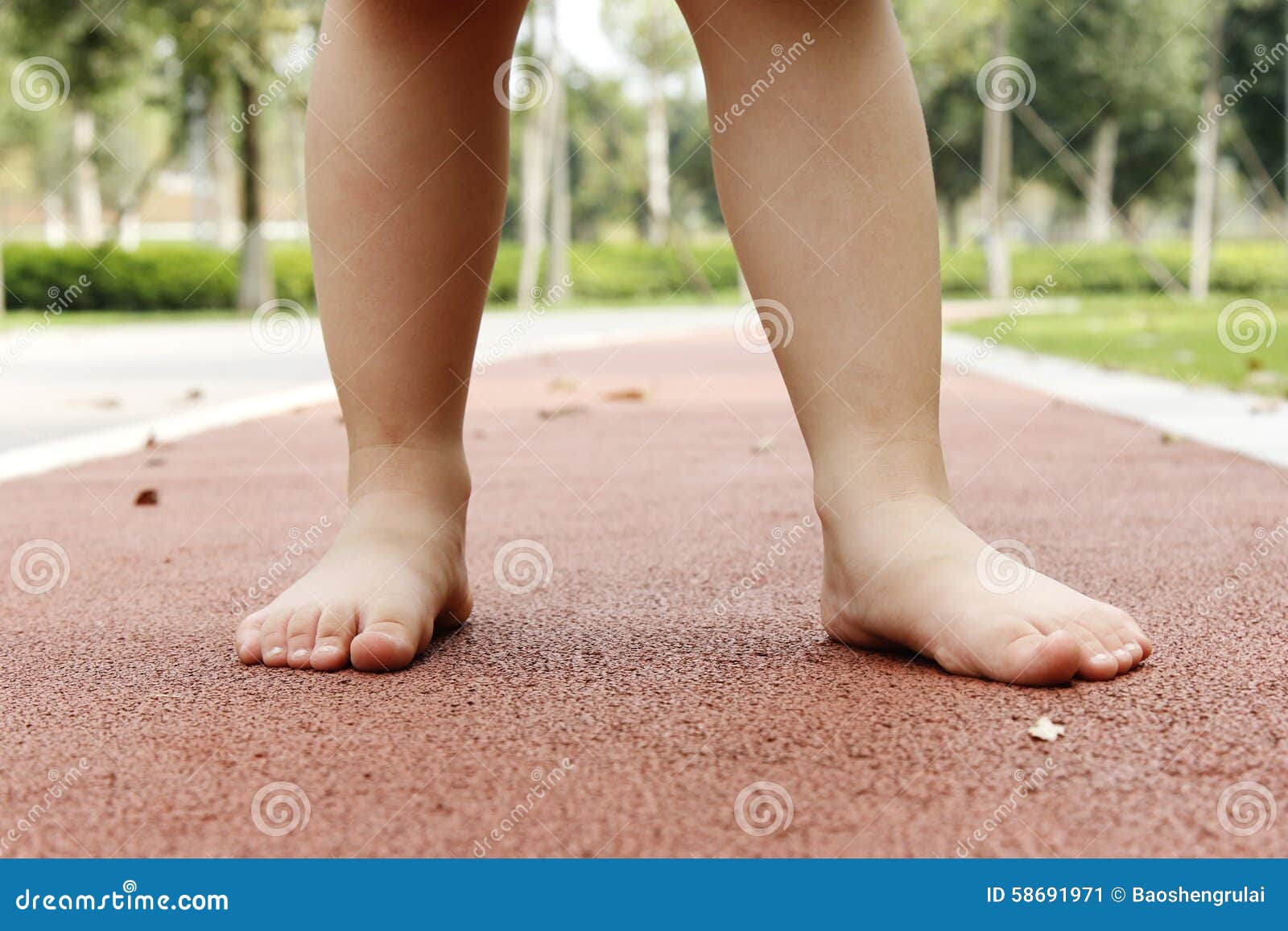 Childs foot stock image. Image of lawn, kids, grass, person - 58691971