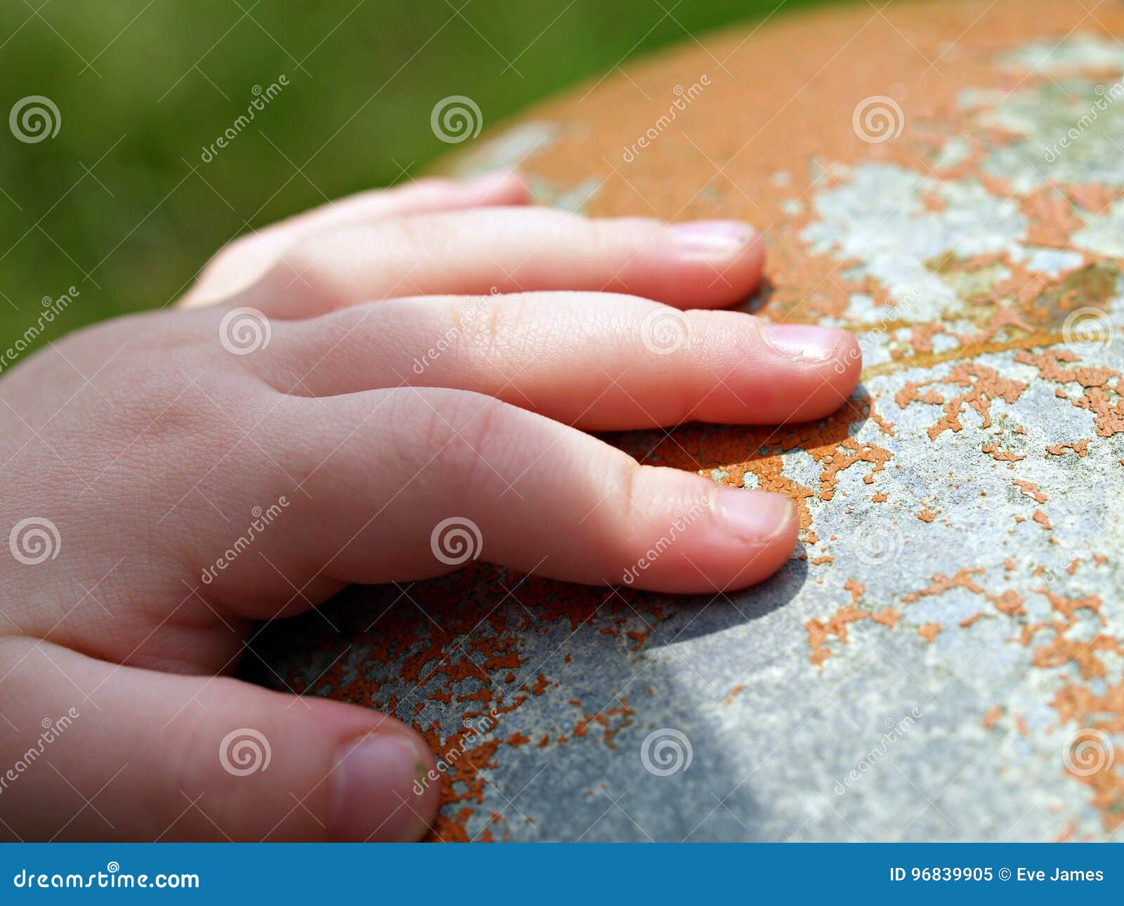 Childs Hand on Rusty Surface Stock Image - Image of rough, rust: 96839905
