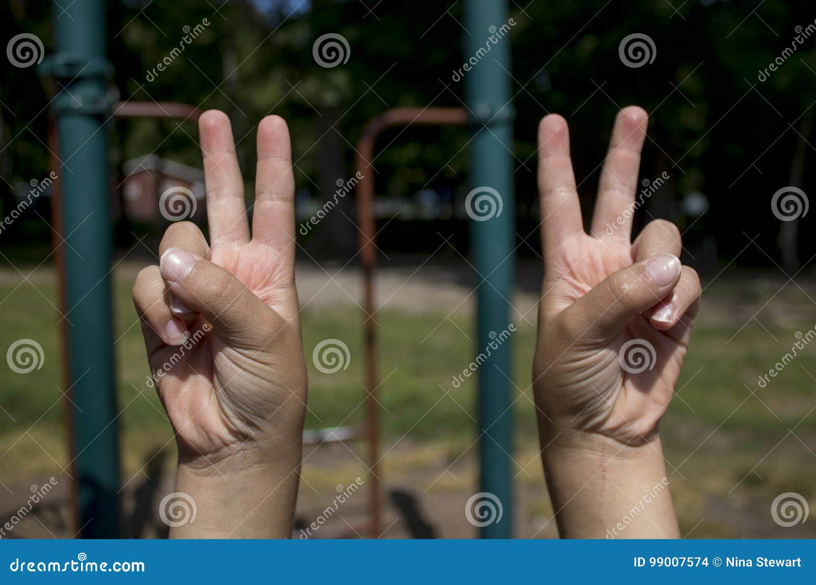 Childs Hands Making Peace Signs Stock Photo - Image of line, four: 99007574