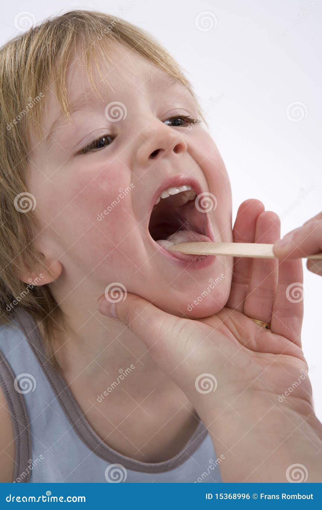 Childs tonsils are checked stock photo. Image of throat - 15368996