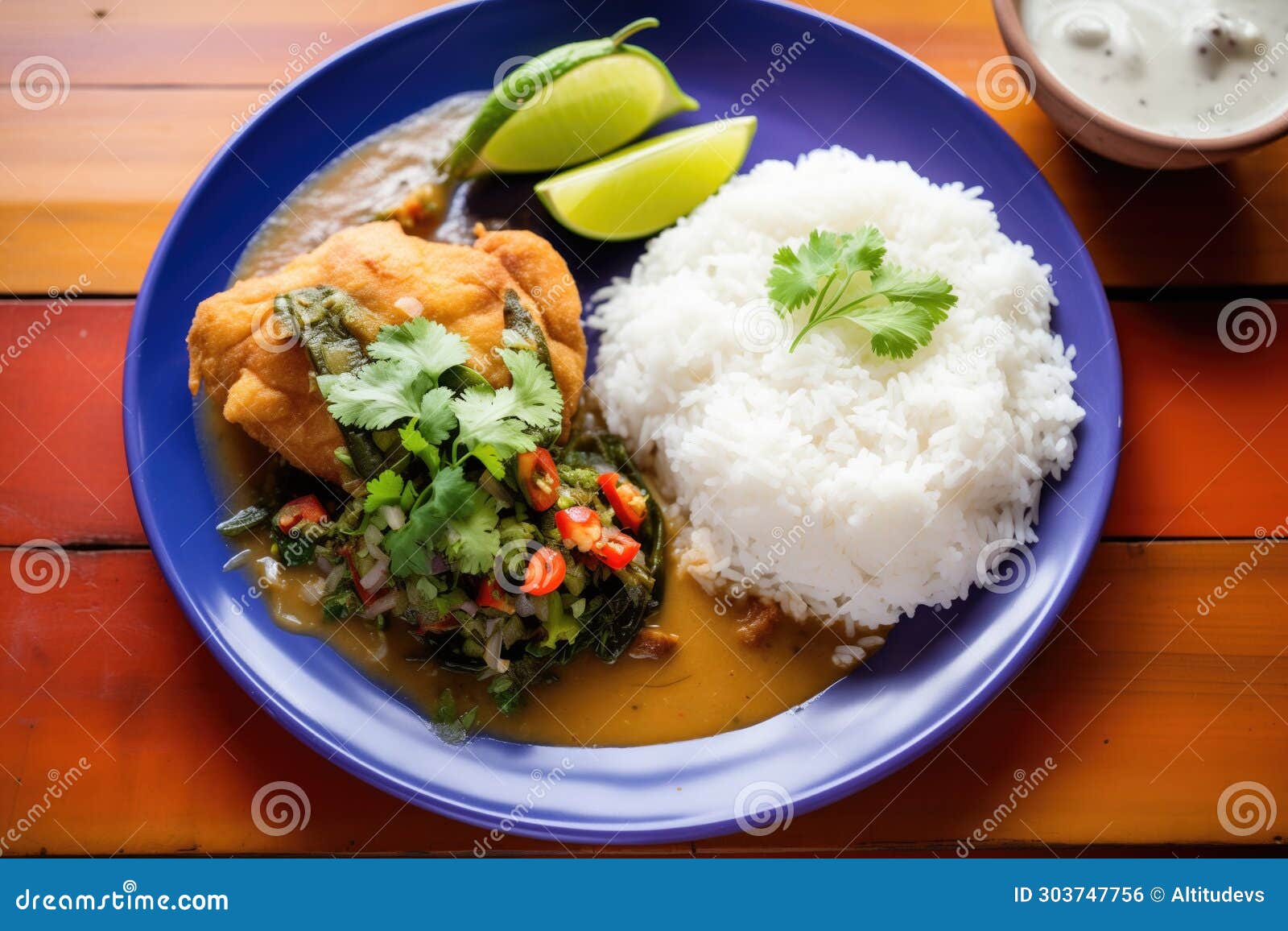 Chiles Rellenos Served with Rice and Beans on a Plate Stock ...