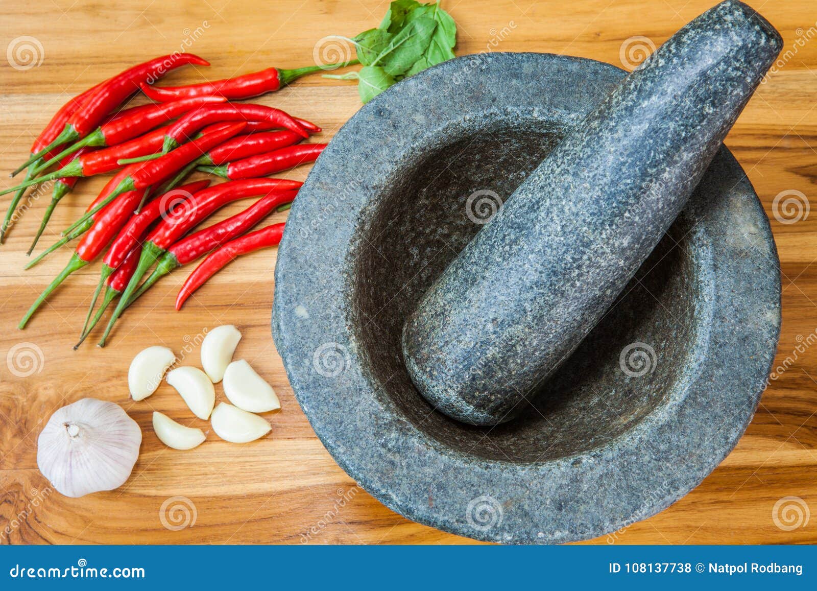 Chili and Garlic with Stone Mortar on Wooden Stock Photo - Image of ...