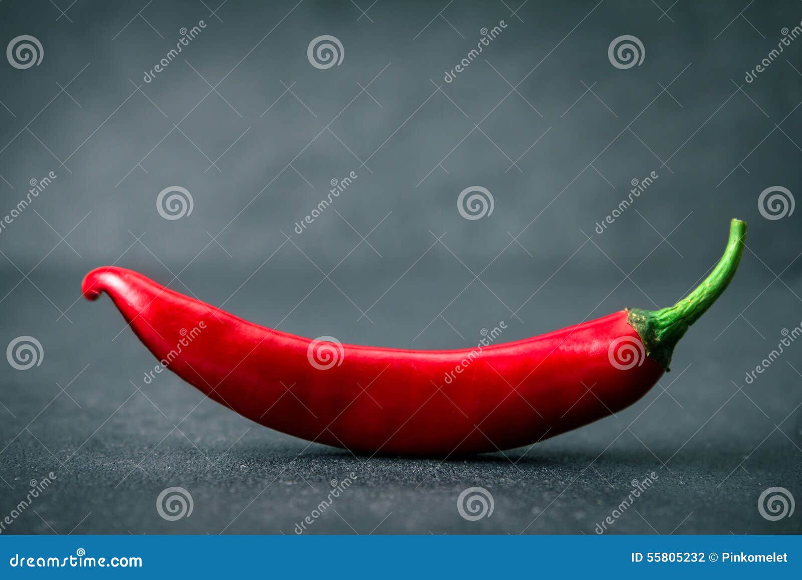 Chili Pepper on Black Stone Background , Smiling Shape Stock Photo ...