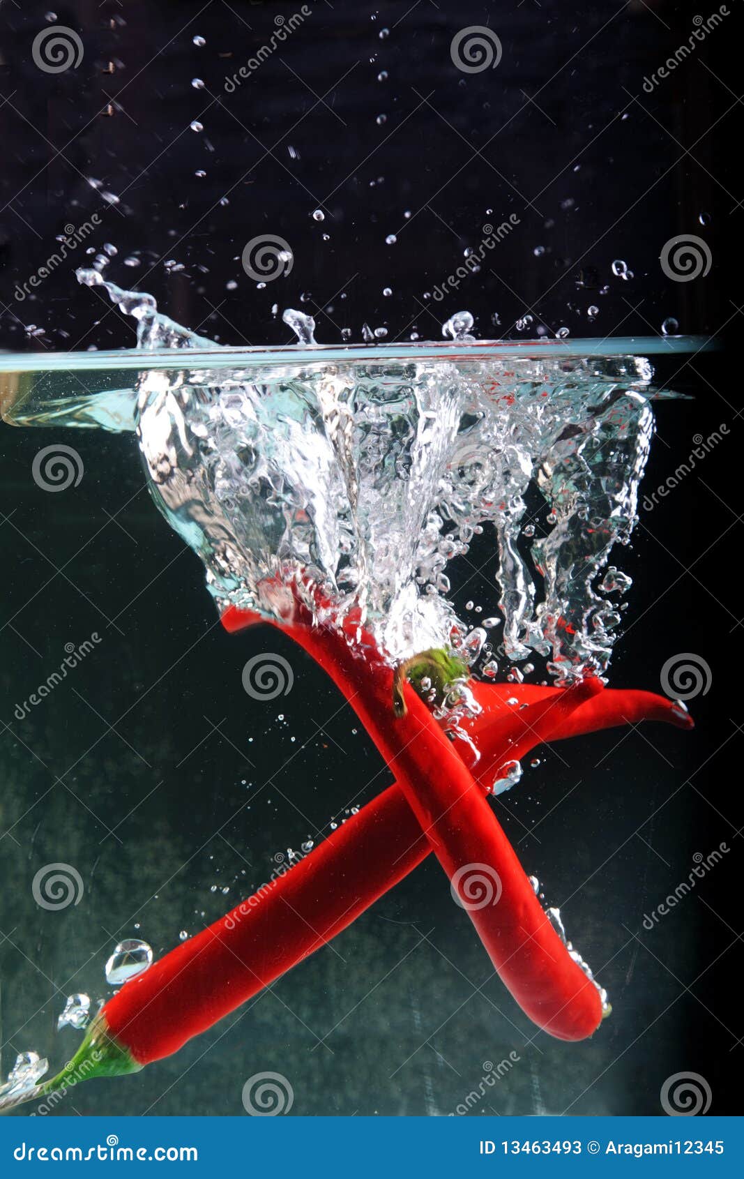 Chili in water splash stock image. Image of colors, kitchen - 13463493