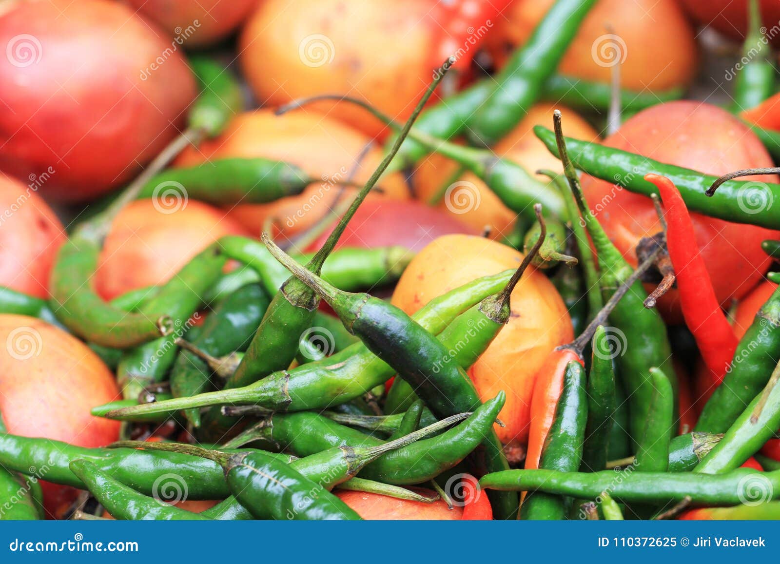 Chilli pepper and mango stock image. Image of closeup - 110372625