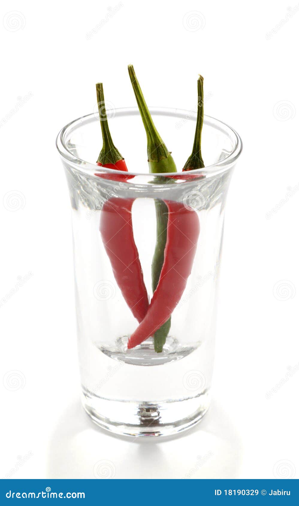 Chillies in a Shot Glass stock image. Image of flavor - 18190329