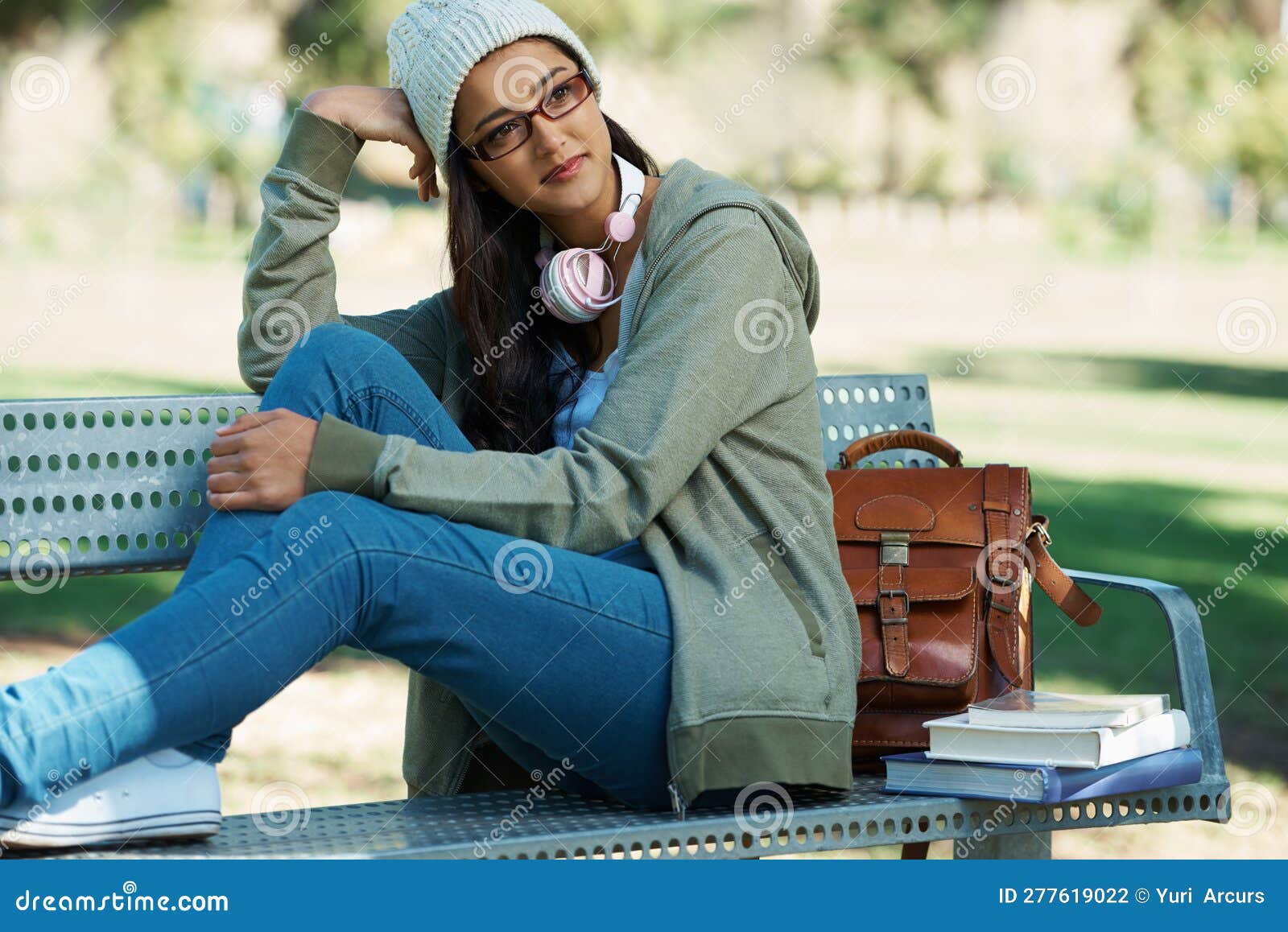 Chilling between Classes. an Attractive College Student Relaxing on a ...