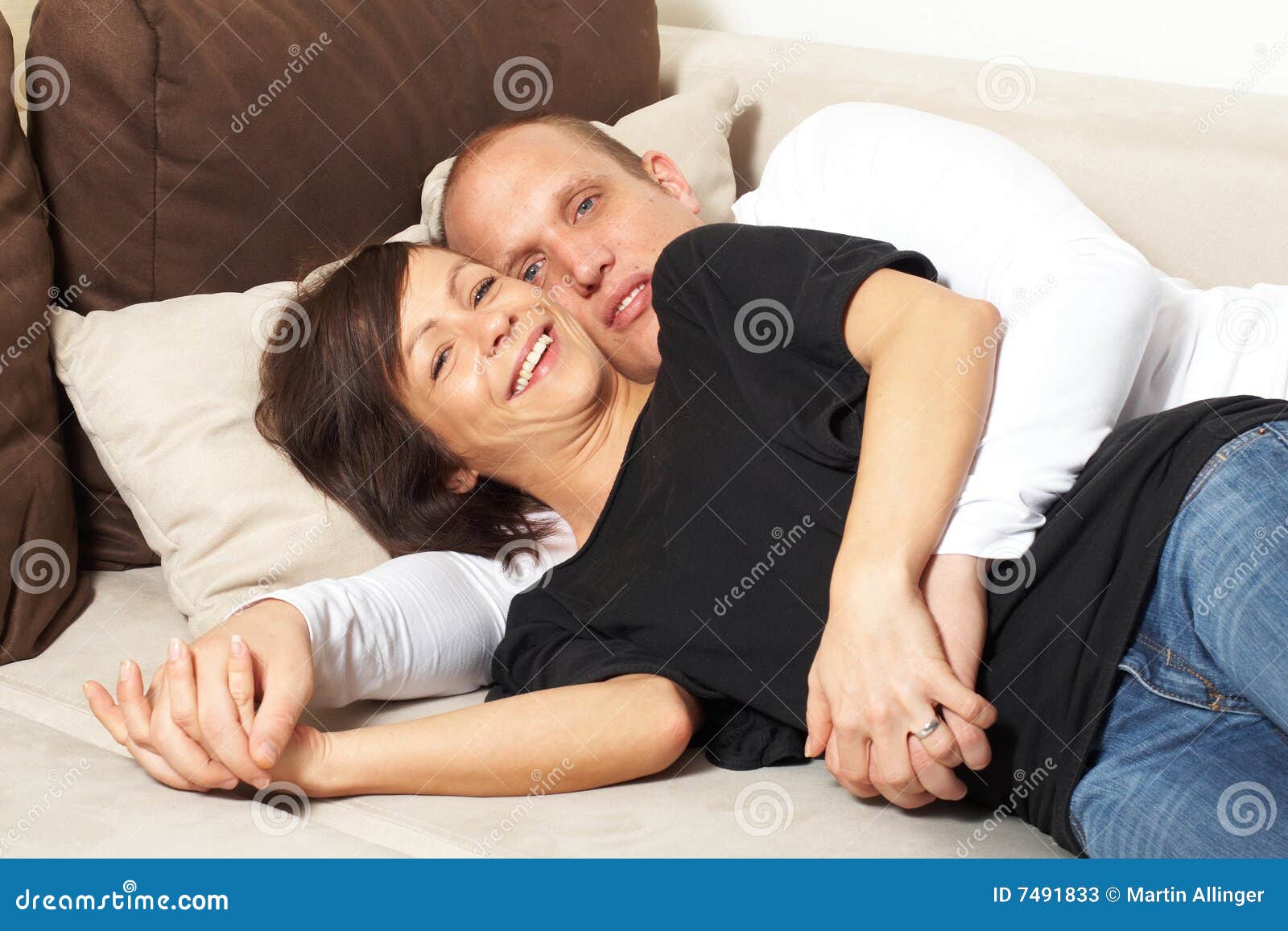 Chilling on the couch stock image. Image of male, people - 7491833