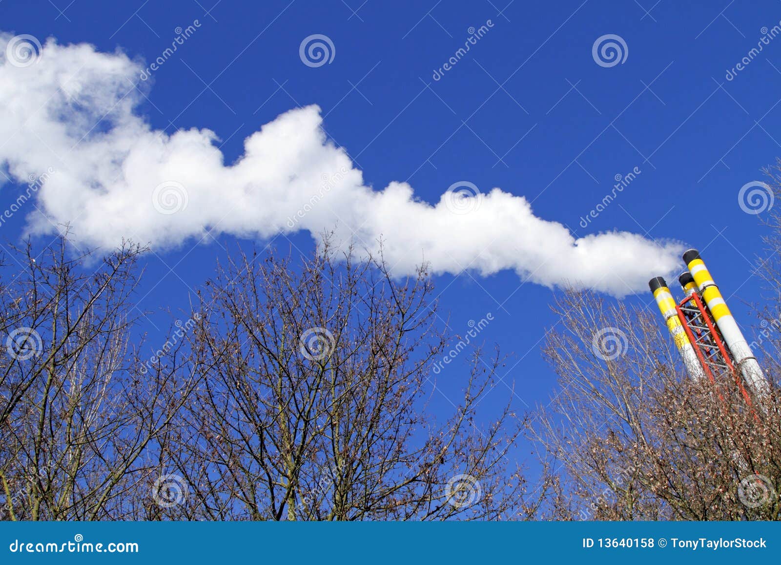Chimney Emitting Smoke Against a Blue Sky Stock Photo - Image of ...