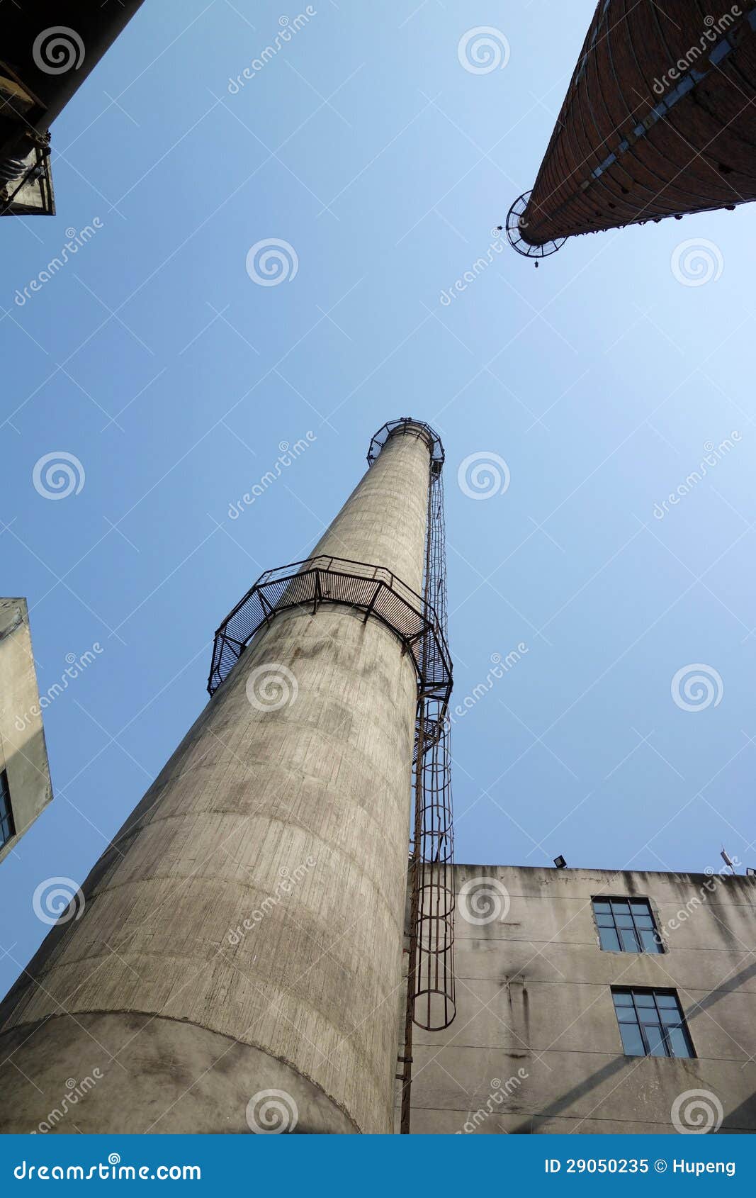 Chimney in Factory stock image. Image of corporate, blue - 29050235