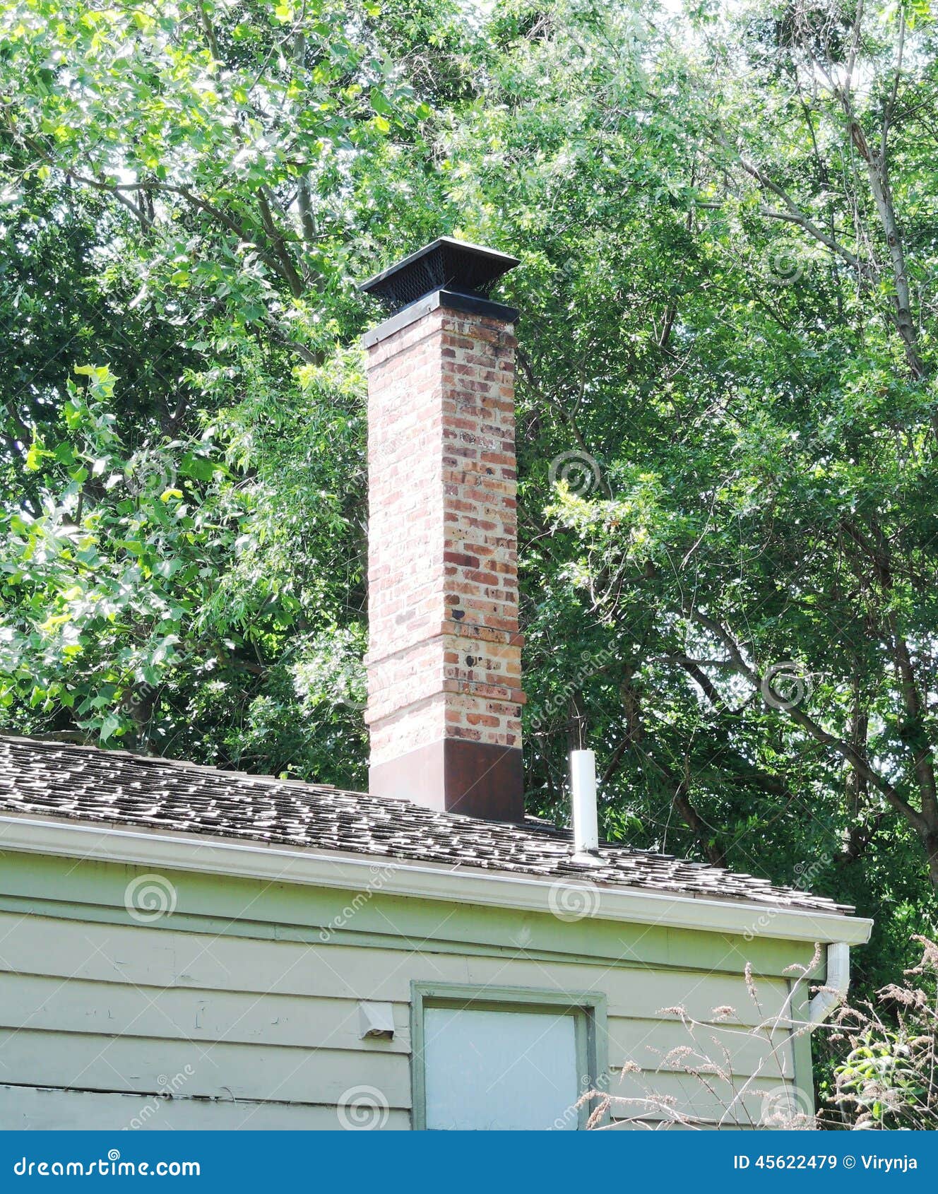 Chimney on the roof stock image. Image of cover, brick - 45622479