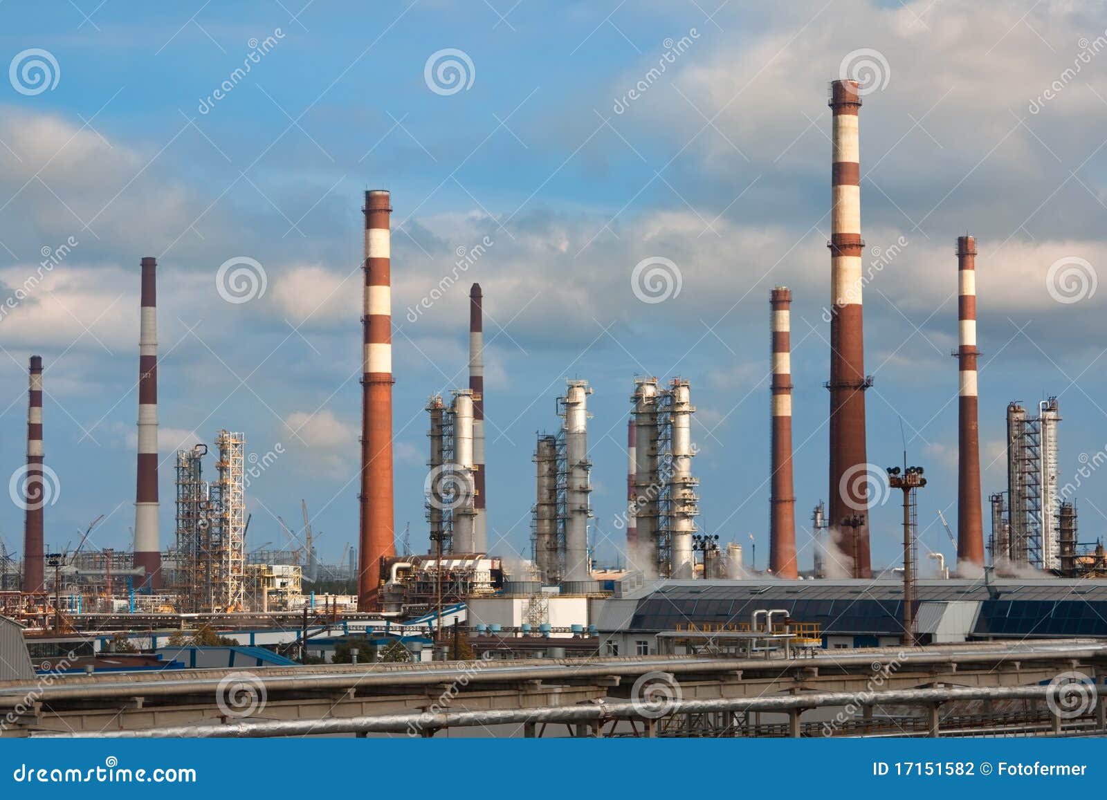 Chimneys of oil refinery stock photo. Image of building - 17151582