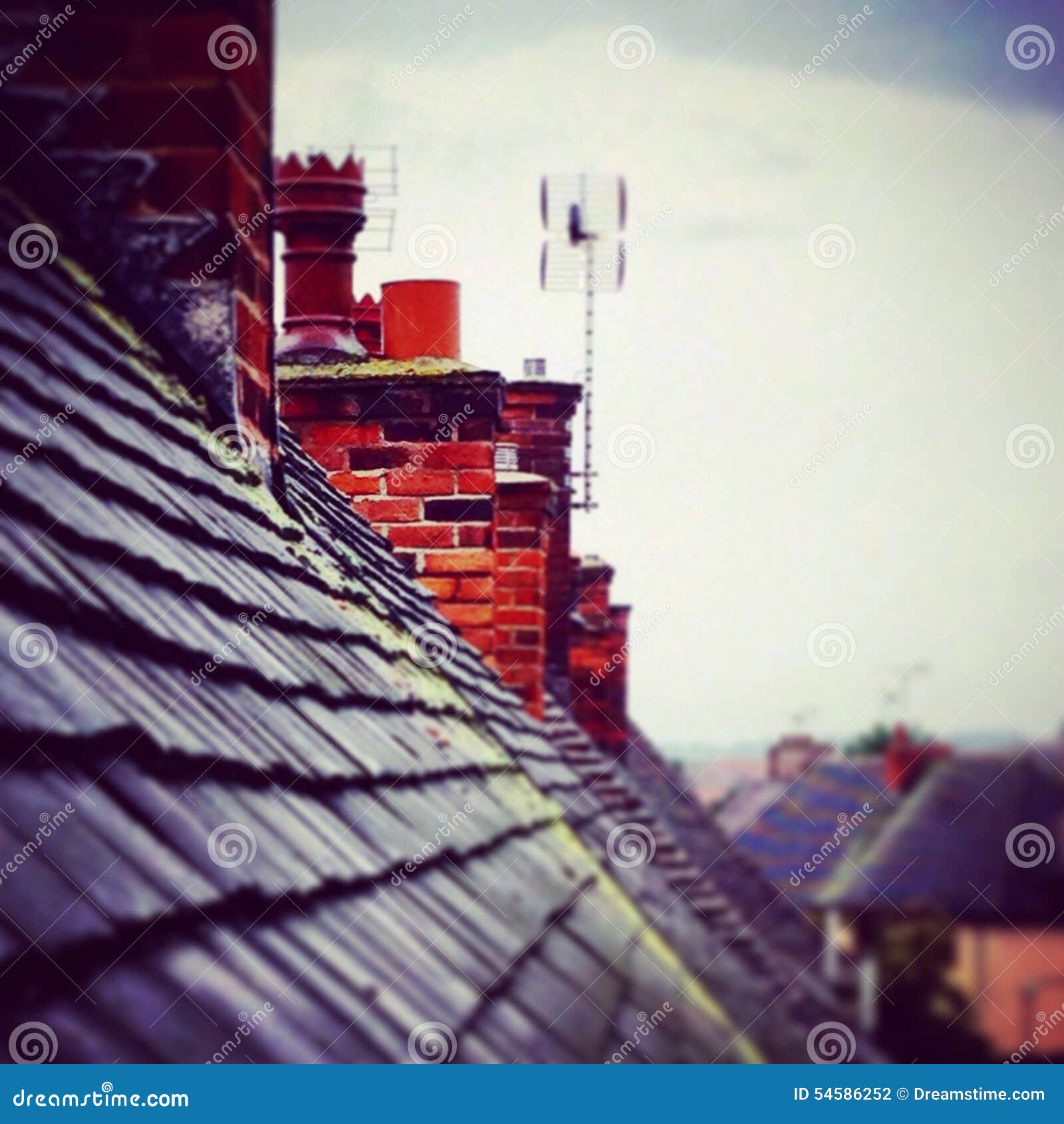 Chimneys and rooftops stock photo. Image of distance - 54586252