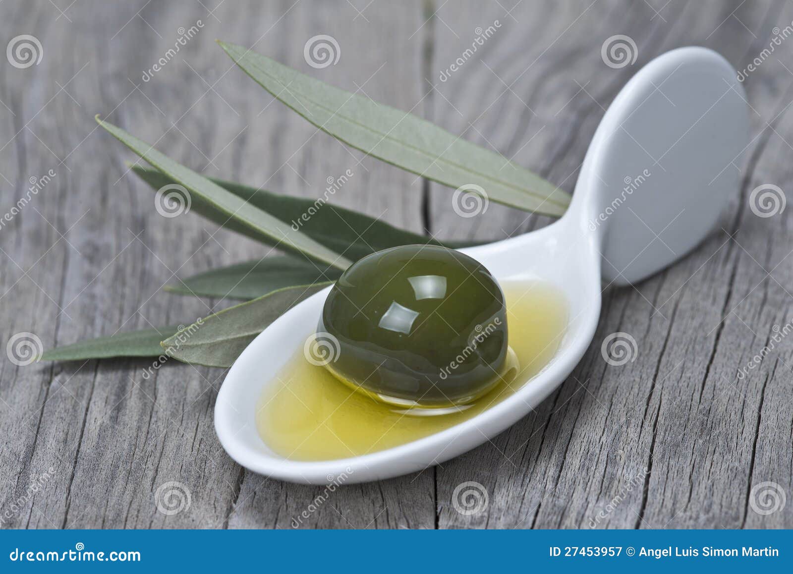 China Spoon with One Olive and Oil Stock Image - Image of agriculture ...