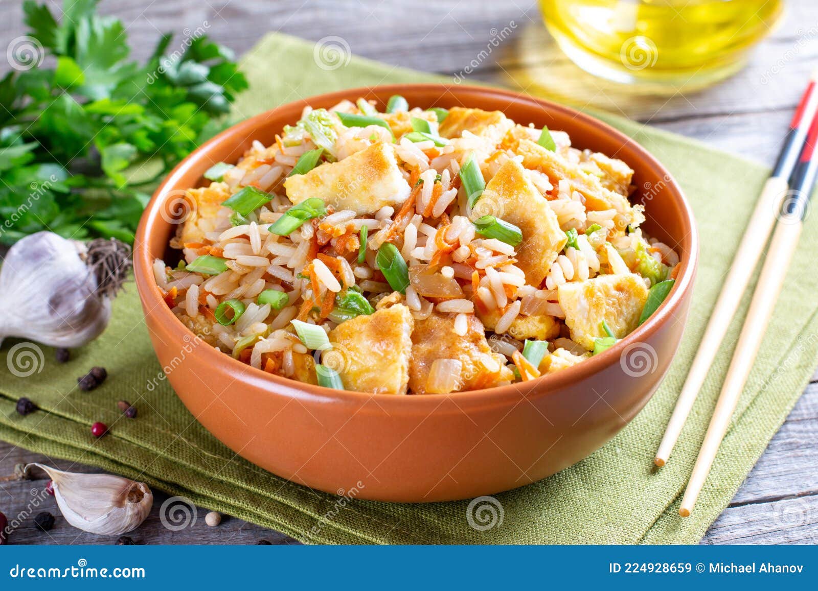 Chinese Asian Egg and Vegetable Fried Rice on a Plate on a Table Stock ...