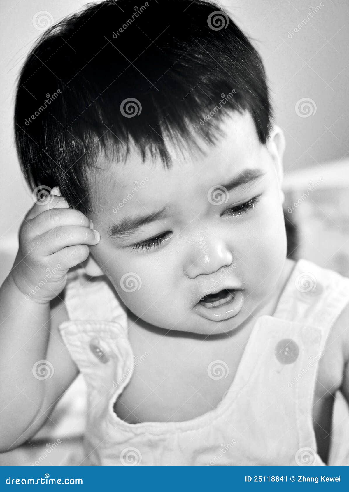 A chinese baby is crying stock image. Image of unhappy - 25118841