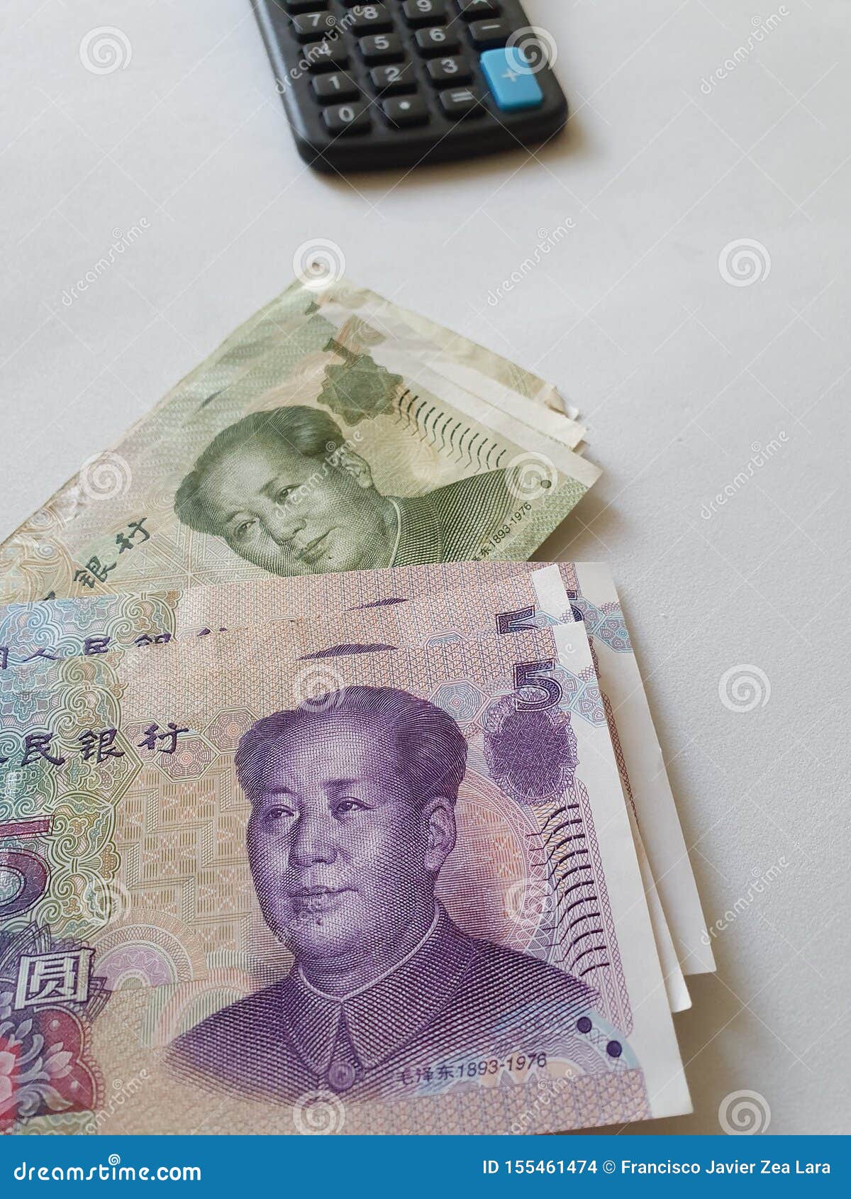 Chinese Banknotes of Different Denominations and Calculator on White ...