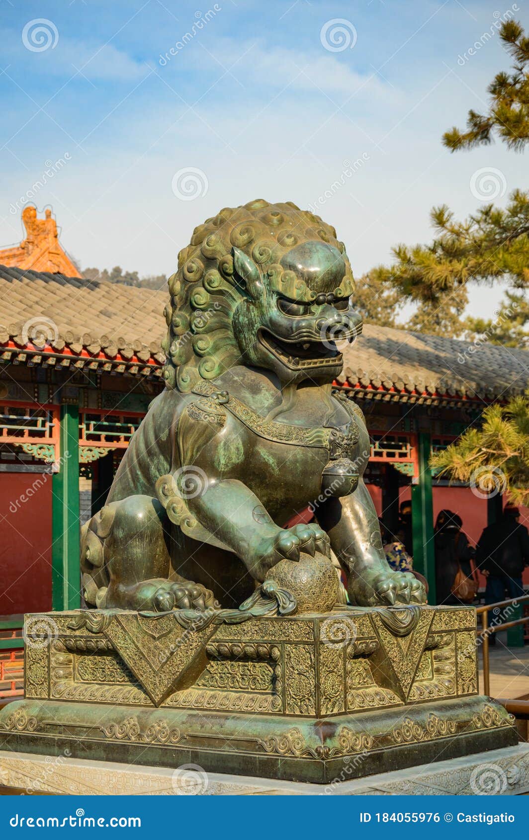 A Chinese Bronze Lion Sits on the Landing in Front of the Building ...