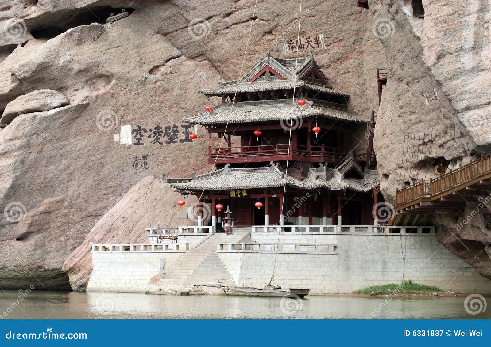 Chinese building on cliff stock image. Image of water - 6331837