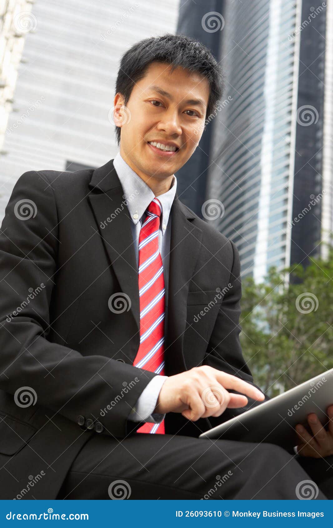 Chinese Businessman Working on Tablet Computer Stock Photo - Image of ...