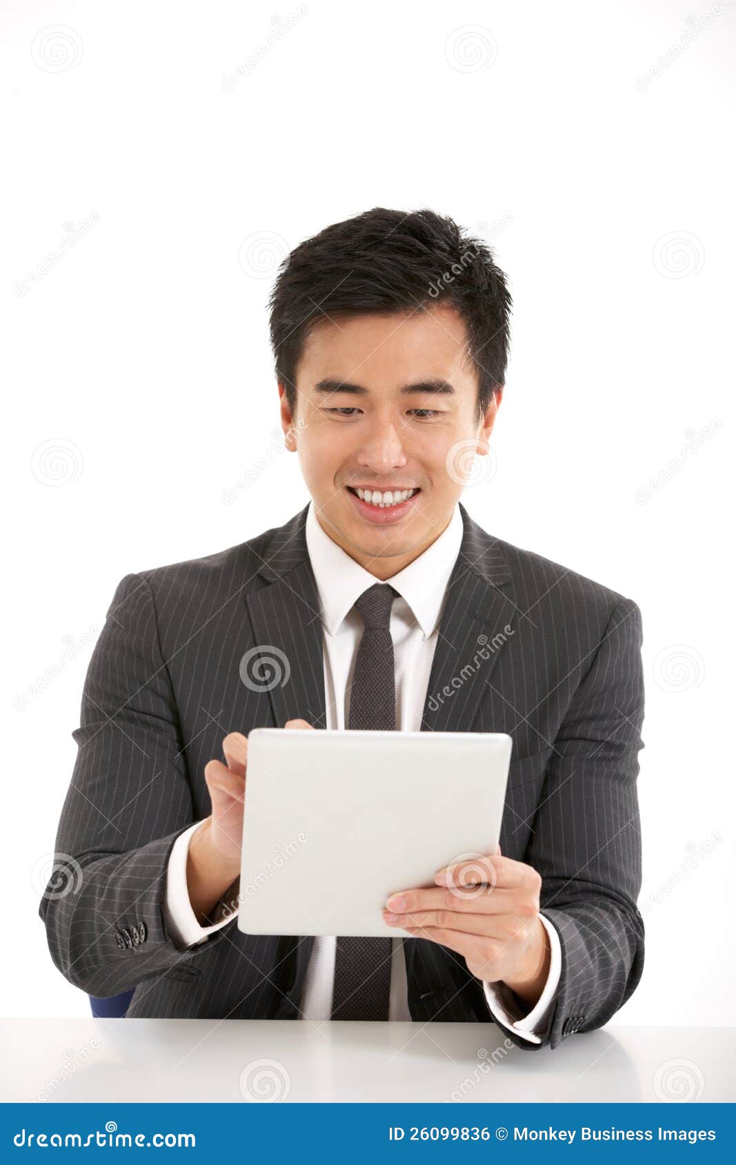 Chinese Businessman Working on Tablet Computer Stock Photo - Image of ...