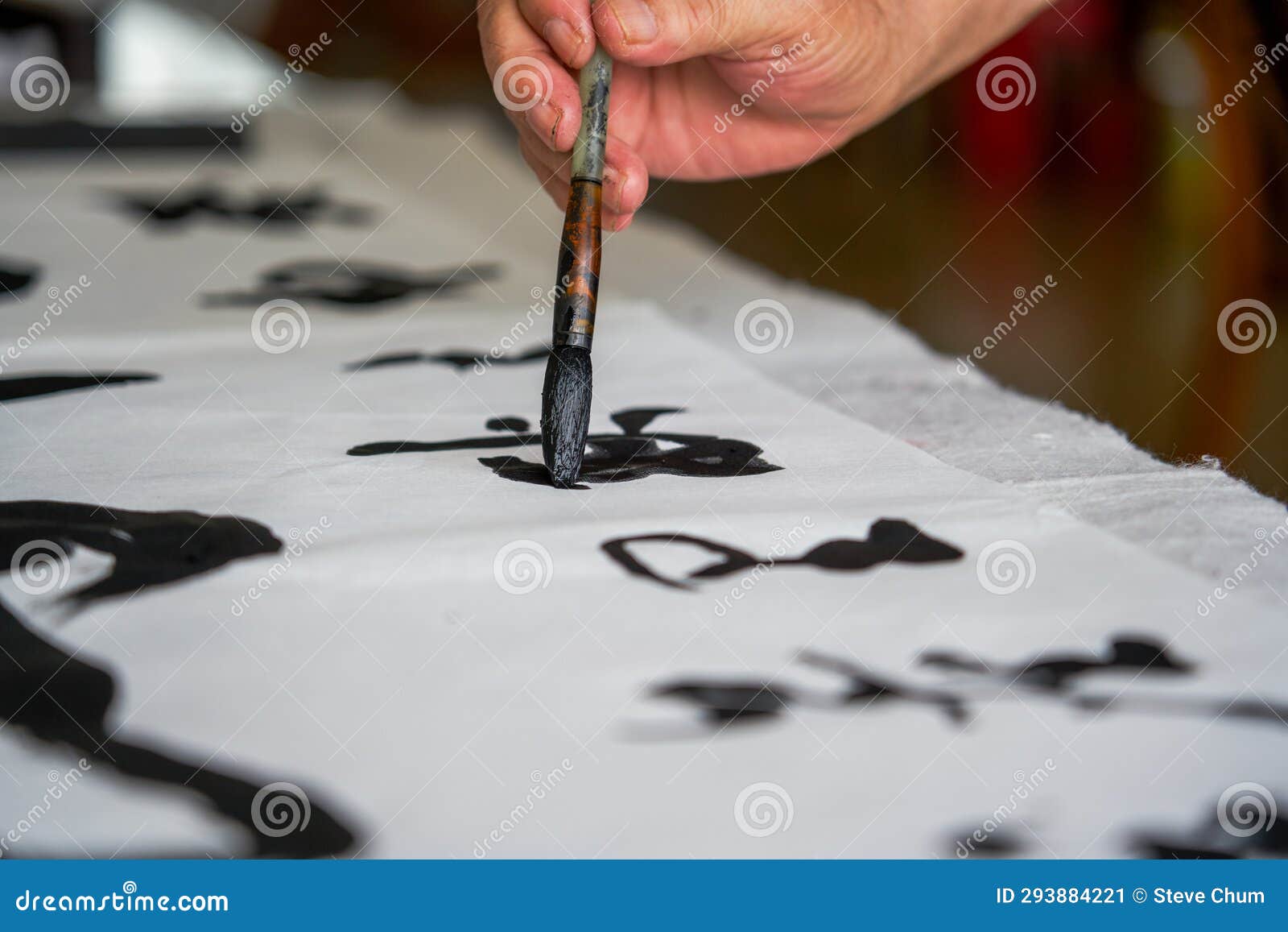 A Chinese Calligrapher Writes Calligraphy and Creates a Calligraphy ...