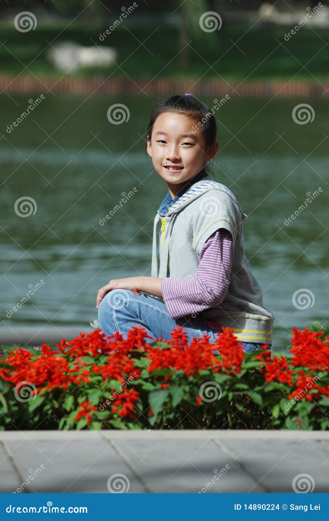 Chinese child with flowers stock photo. Image of smile - 14890224