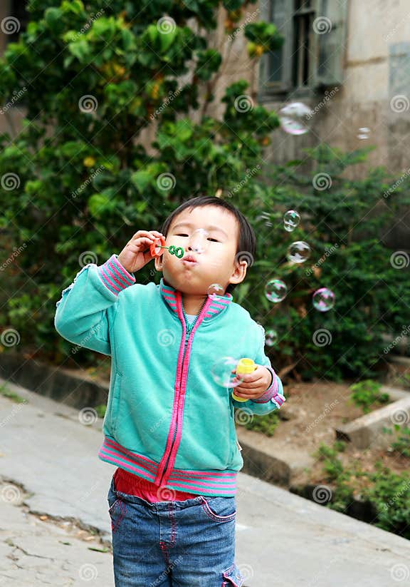Chinese children playing. stock image. Image of lovely - 7113253