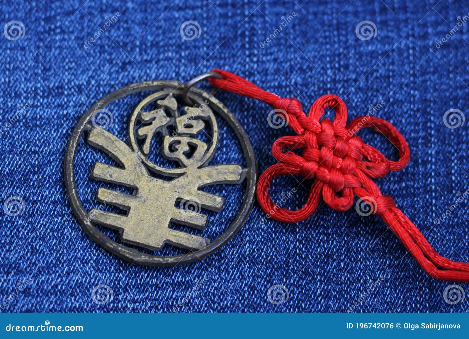 Chinese Coins with Red Thread on Jeans Stock Photo - Image of aged ...