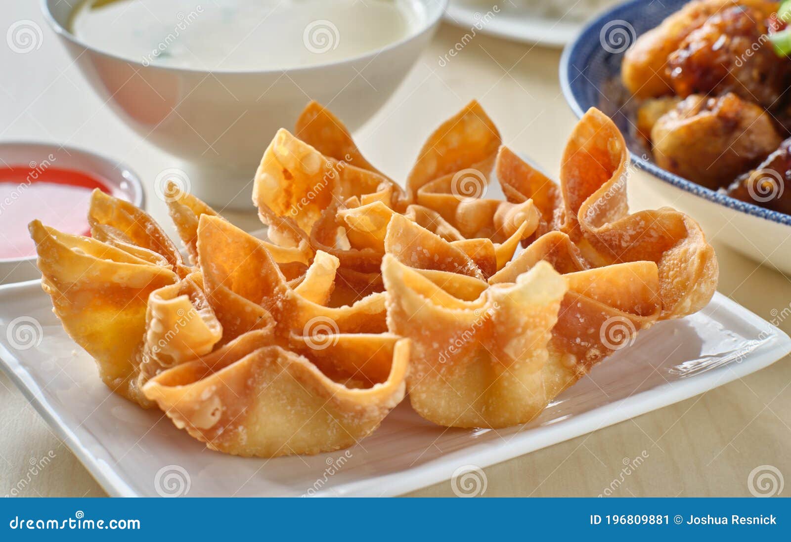 Chinese Crab Rangoon Fried Wontons on Plate with Red Sauce Stock Image ...