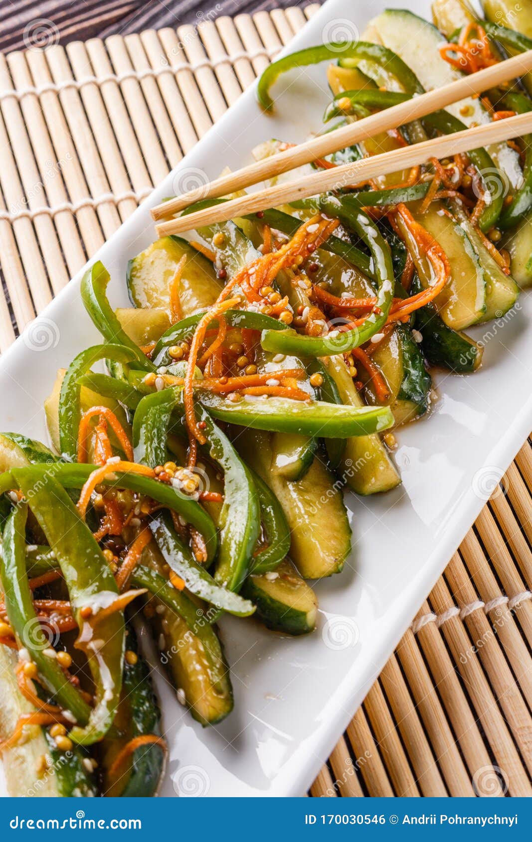 Chinese Cucumbers on Bamboo Mat on Rustic Background Stock Photo ...