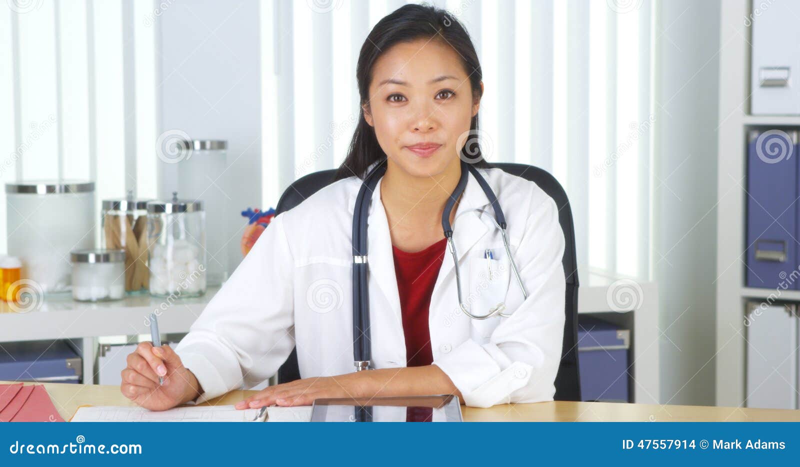 Chinese Doctor Talking To Camera Stock Photo - Image of medicine ...