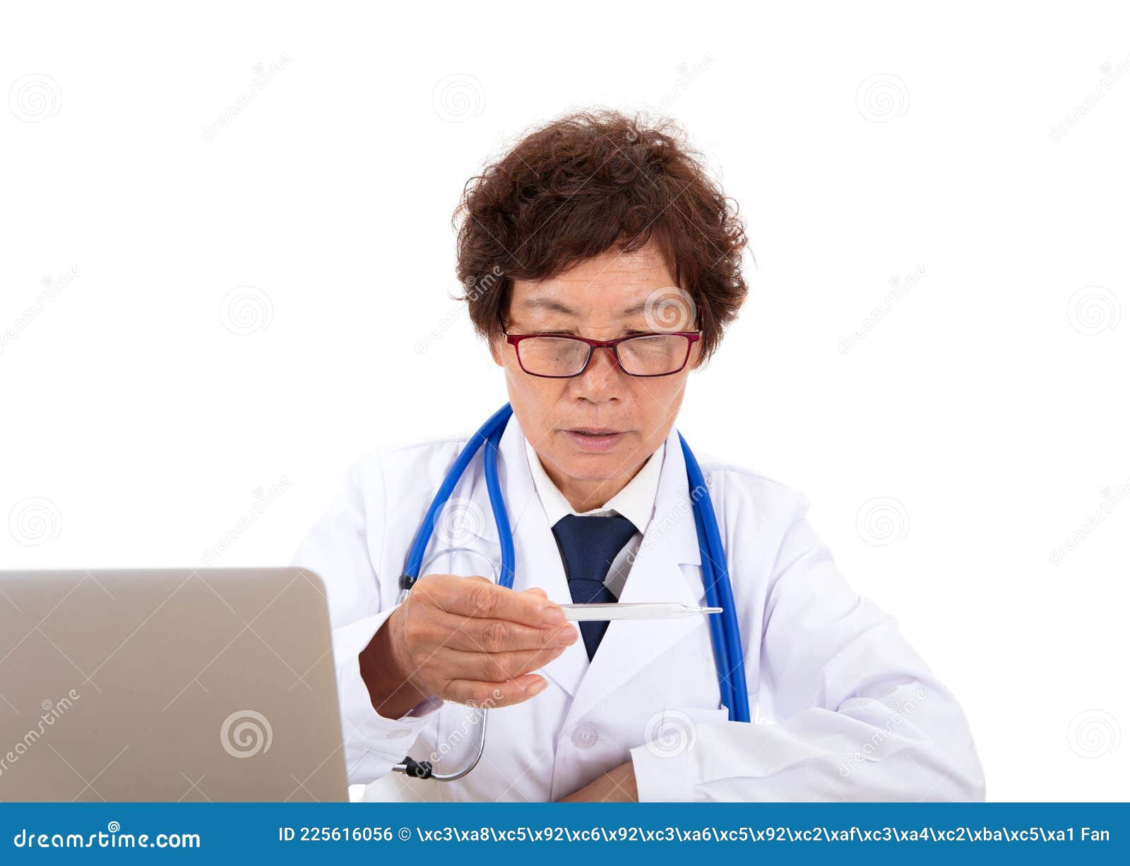 The Chinese Doctor at Work is Looking at the Thermometer Stock Photo ...