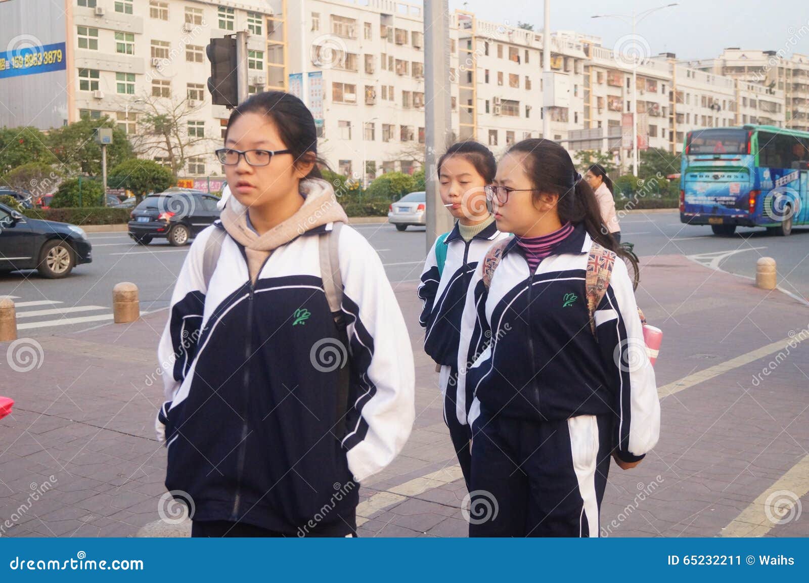 Chinese female students editorial photo. Image of walking - 65232211